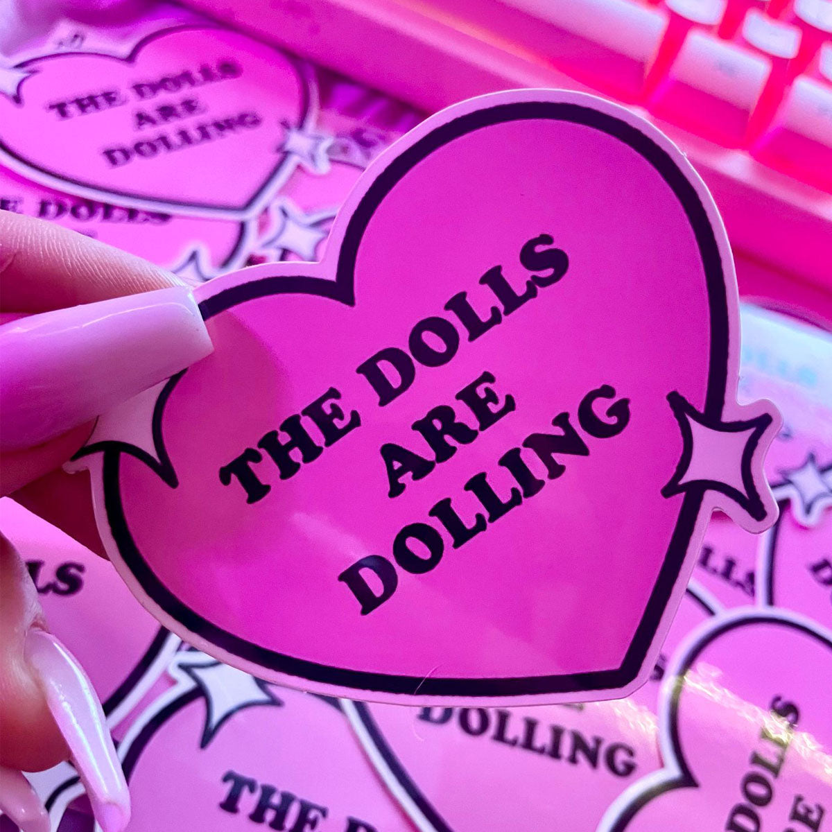 THE DOLLS ARE DOLLING STICKER – nikkilipstick